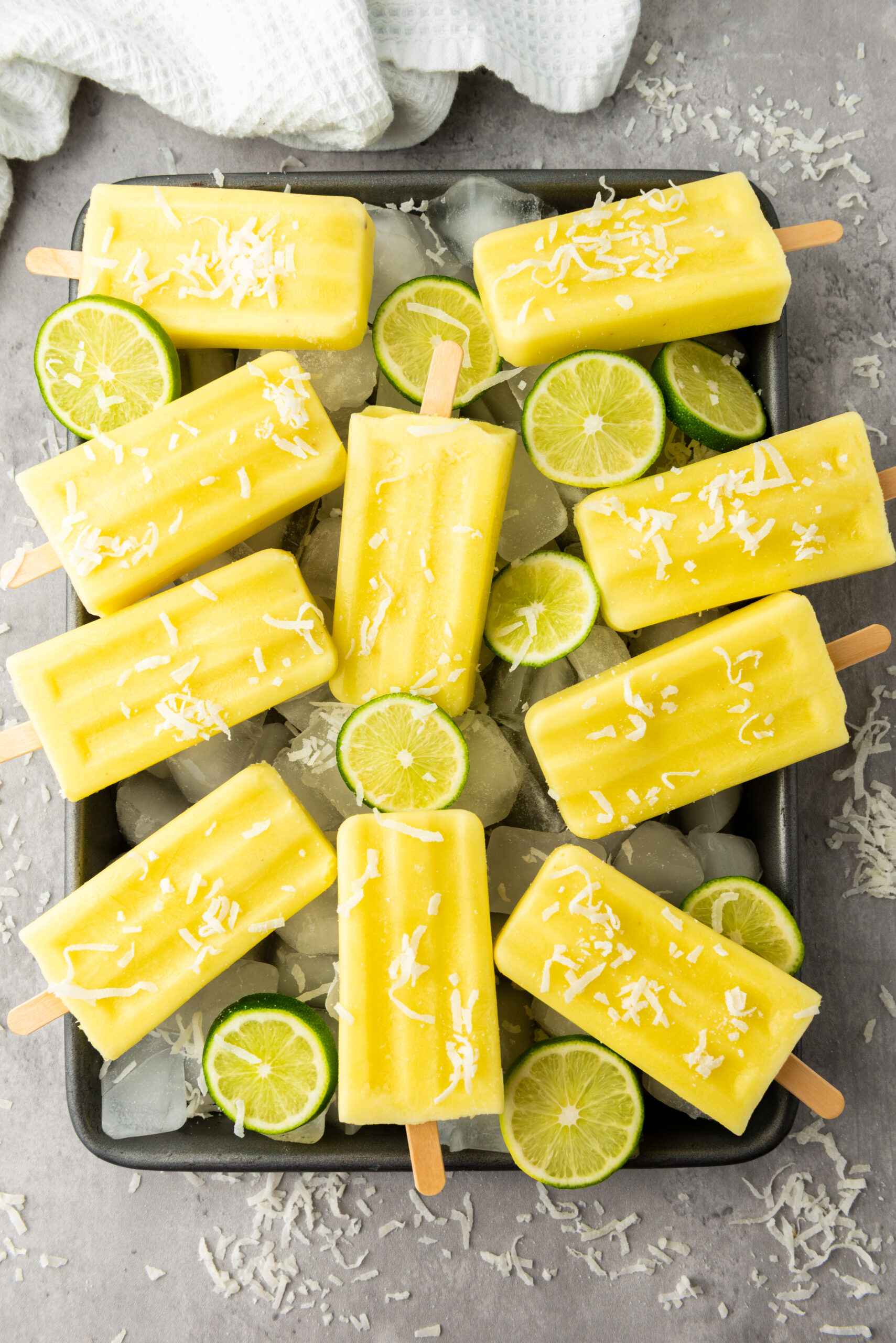 Pineapple Coconut Lime Popsicles - Scoop & Sprinkle